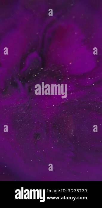 Vertical video. Sparkling texture. Splash liquid. Defocused purple pink ...