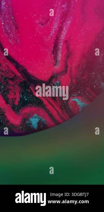 Vertical video. Shiny spilling. Flowing paint. Defocused pink blue neon ...