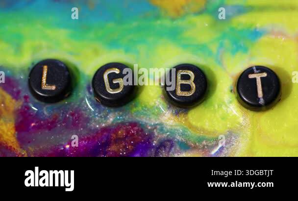 Lgbt word. Glitter ink. Defocused yellow blue purple color sparkling ...