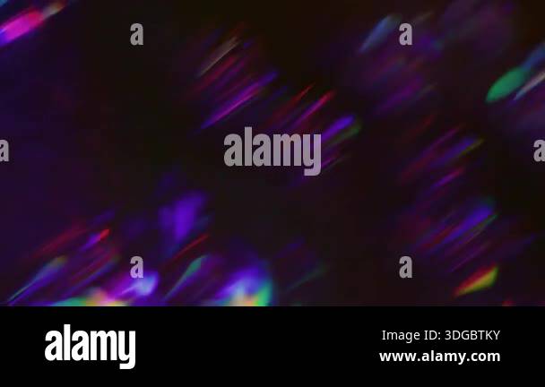 Defocused kaleidoscope glow. Beam prism. Rainbow color shimmering spin ...