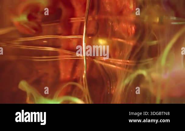 Bright ink wave. Paint drip. Defocused yellow golden orange color shiny ...