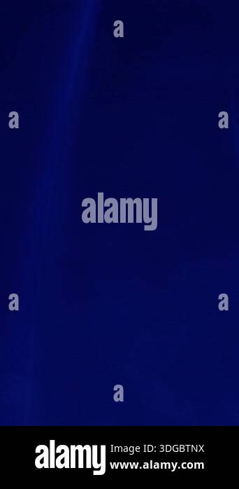 Vertical video. Mist fume. Water ink. Defocused blue neon color smoke ...