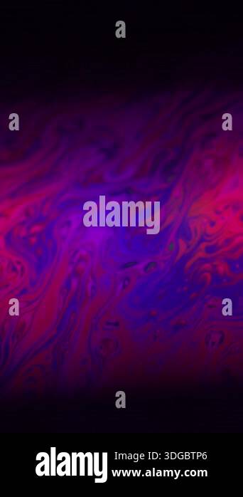 Vertical video. Colorful fluid. Swirl soap. Spectrum oil liquid fantasy ...