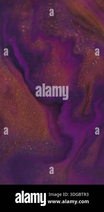 Vertical video. Fluid spill. Water art. Defocused purple golden color ...