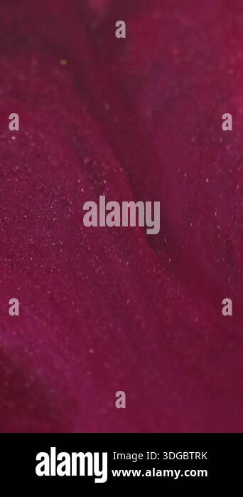 Vertical video. Blur shiny wave. Sparkling fluid. Defocused pink red ...