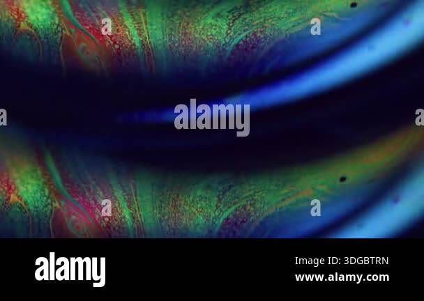 Defocused light liquid. Iridescent art. Blue green orange color flow ...