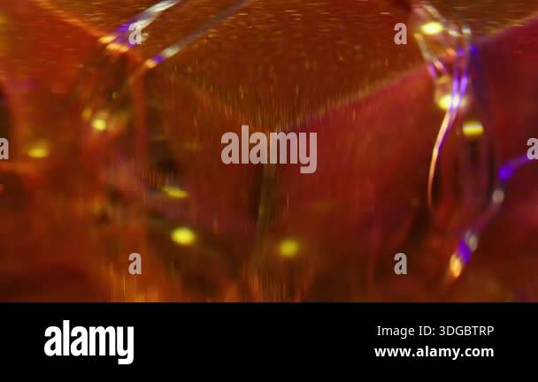 Paint drip. Luminous light. Defocused golden pink neon color cube fume ...