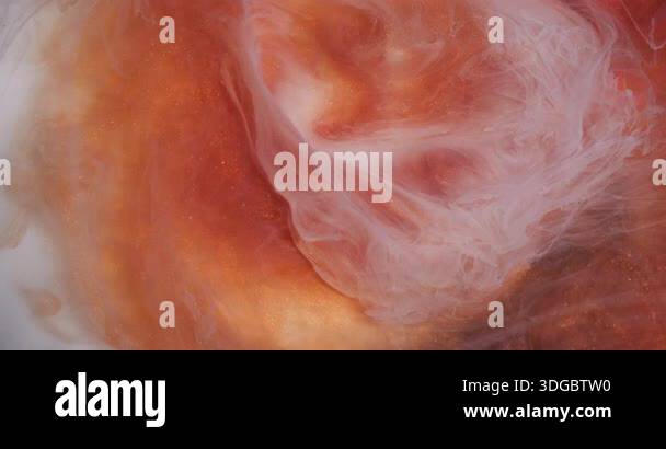 Glitter cloud. Ink explosion. Defocused orange white color bright smoke ...