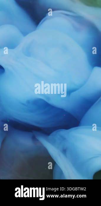 Vertical video. Paint water splash. Smoke cloud texture. Defocused blue ...