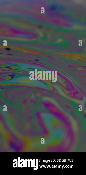 Vertical video. Soap colorful chaos. Paint blend. Vibrant wave curl ...