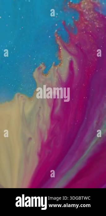 Vertical video. Fluid spill. Water art. Defocused blue yellow magenta ...