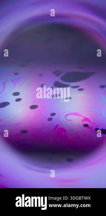 Vertical video. Space blur sphere. Ink spill. Fantastic neon color ...