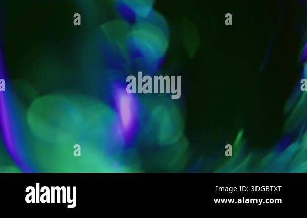 Colorful defocused leak. Reflection flash texture. Blue green flare ...