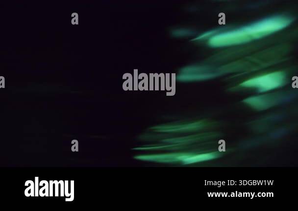 Lens leak defocused. Crystal flicker. Green color shiny flash texture ...