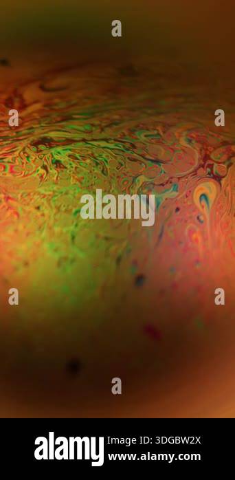 Vertical video. Paint blur swirl. Liquid planet sphere. Yellow red ...