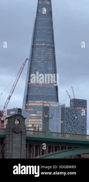 Iconic shard skyscraper with its distinctive red illuminated spire ...