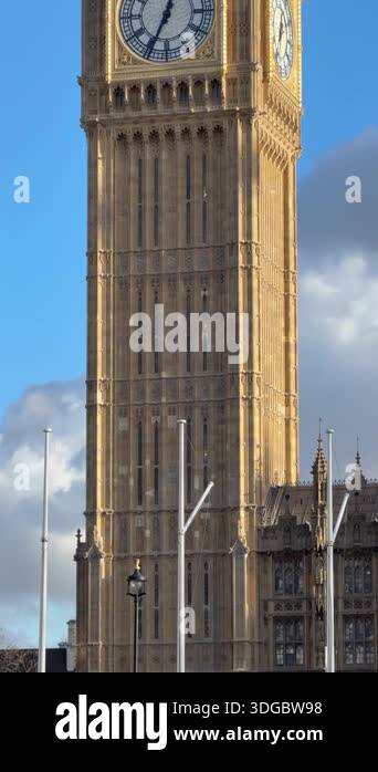 Iconic elizabeth tower, commonly known as big ben, tilting upwards ...