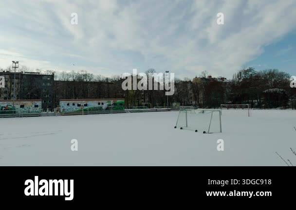 Wide Shot of Snow Covered Football Field in a frozen Berlin. High ...