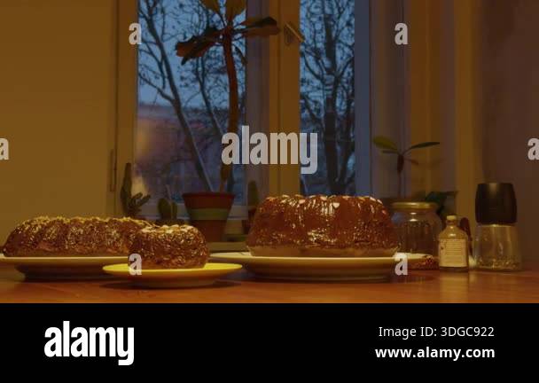 Close-up details of a mother lightning candles on homemade chocolate ...