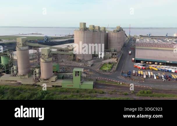 Aerial drone view of huge coal and iron ore storage depot, piles of ...