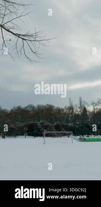 Vertical Shot of Snow Covered Football Field in a frozen Berlin. High ...