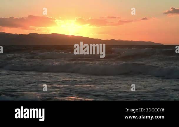 Breathtaking 4K aerial footage capturing a vibrant sunset over the ...