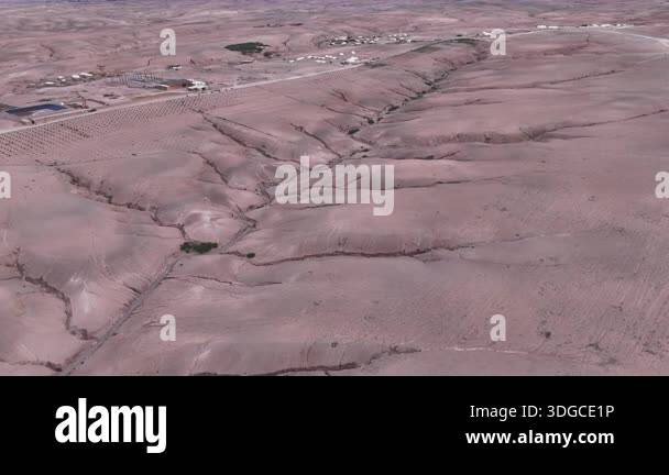 aerial view of braided ravines and dry wash channels carved into ...