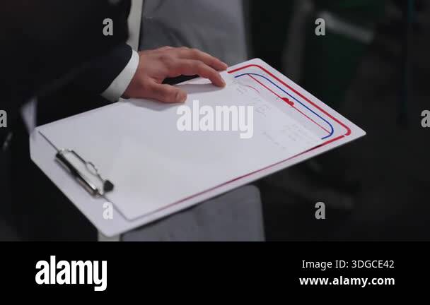 Businessman hands gesture over clipboard with paper sheet closeup ...