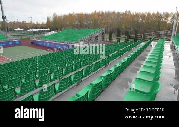 Large tennis court complemented by massive spectator stands on ...