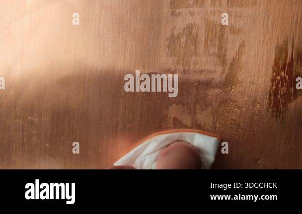 Removing Duct Tape Residue from a Copper Surface. Focus on Copper. Top ...