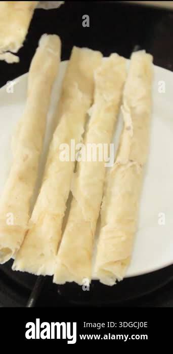Fresh Homemade Crispy Spring Roll Skin Crepes on White Plate Stock ...