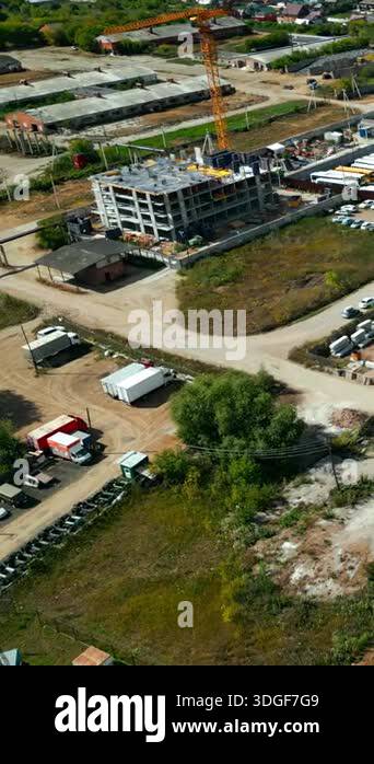 Industrial area expanding with new buildings, warehouses, and equipment ...