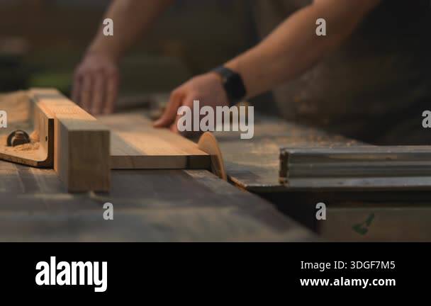 CloseUp Caucasian Furniture Maker Hands Guiding Board Through Table Saw ...