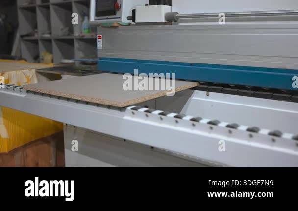 Panel On Cnc Conveyor Under Cutter Showing Blue Gantry And Roller Table ...
