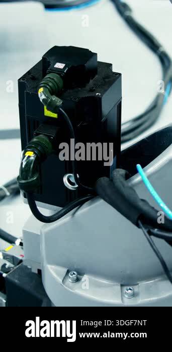 Close up of a robotic arm moving, showcasing its intricate mechanics ...
