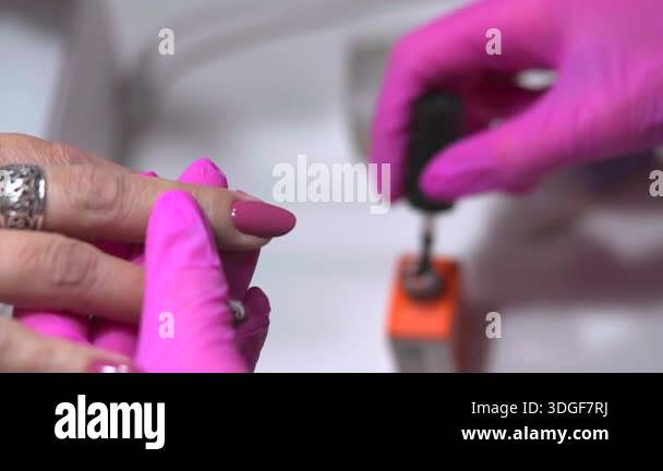 CloseUp Electric File And Metal Tip Used To Perfect Nail Surface While ...