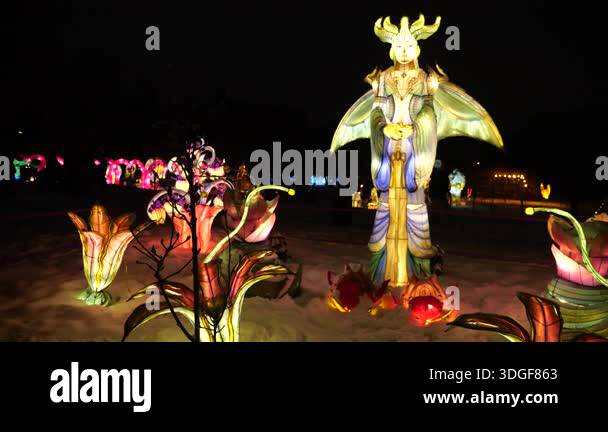 LVIV, UKRAINE - JANUARY 06, 2026: Illuminated warrior queen sculpture ...