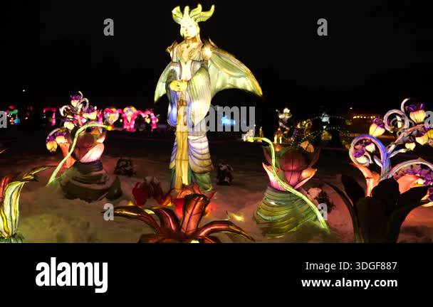 LVIV, UKRAINE - JANUARY 06, 2026: Illuminated warrior queen sculpture ...