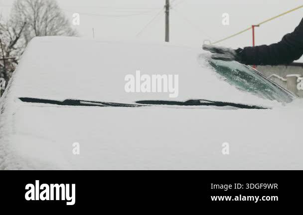 White Man Clearing Windshield Snow, Morning Commute Gloved Hand ...