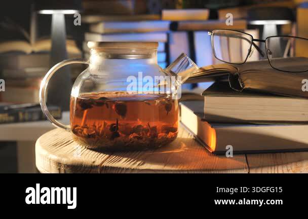 Books and teapot Stock Videos & Footage - HD and 4K Video Clips - Alamy