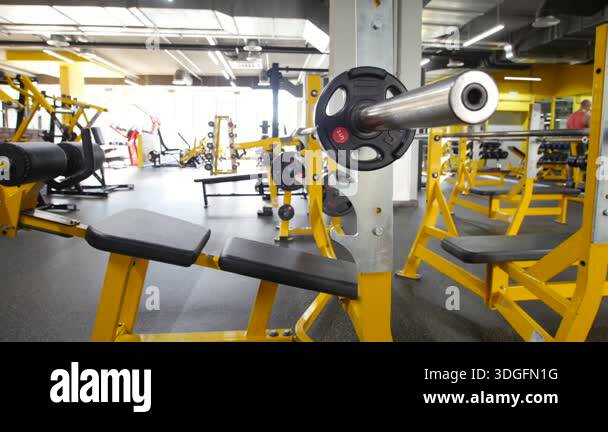 Interior Of Modern Fitness Gym - yellow color, background, slider shot ...