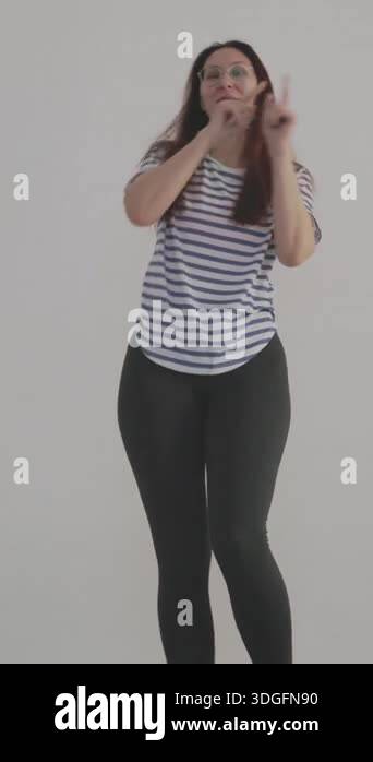 Choreographer practices dance moves, recording herself with a projector ...