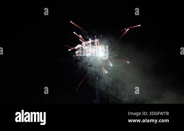 4K video of a vibrant fireworks display lighting up the night sky. The ...