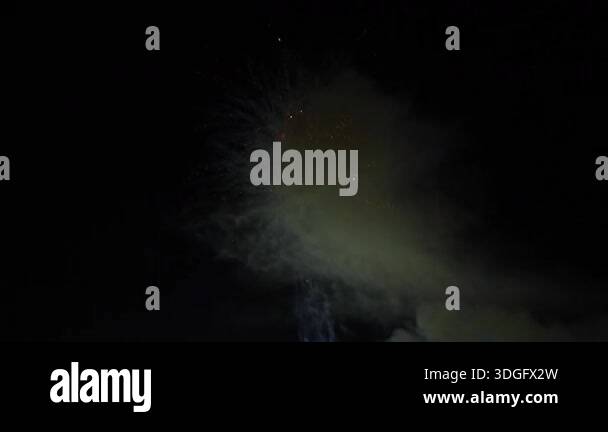 4K video of a vibrant fireworks display lighting up the night sky. The ...