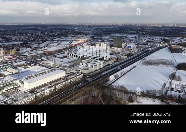 Aerial winter drone footage of production and office buildings in ...