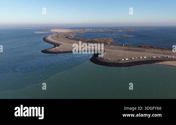 Aerial drone video of the Brouwersdam, a major Delta Works structure ...