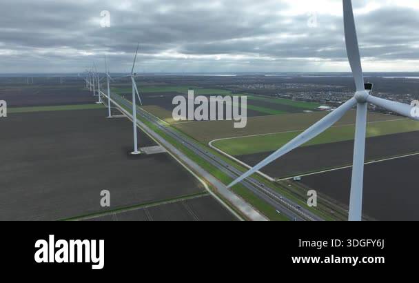 Energy transition, wind park, row of wind mills. Aerial drone views ...