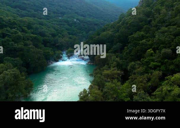 Micos Waterfalls show the beauty of nature in Ciudad Valles. Clear blue ...