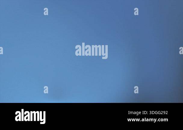 Smooth blue gradient background with subtle light flares and soft bokeh ...