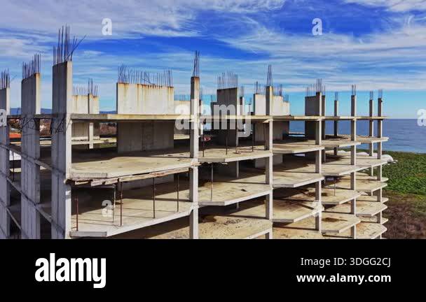 An aerial view of a partially constructed building stands near the ...